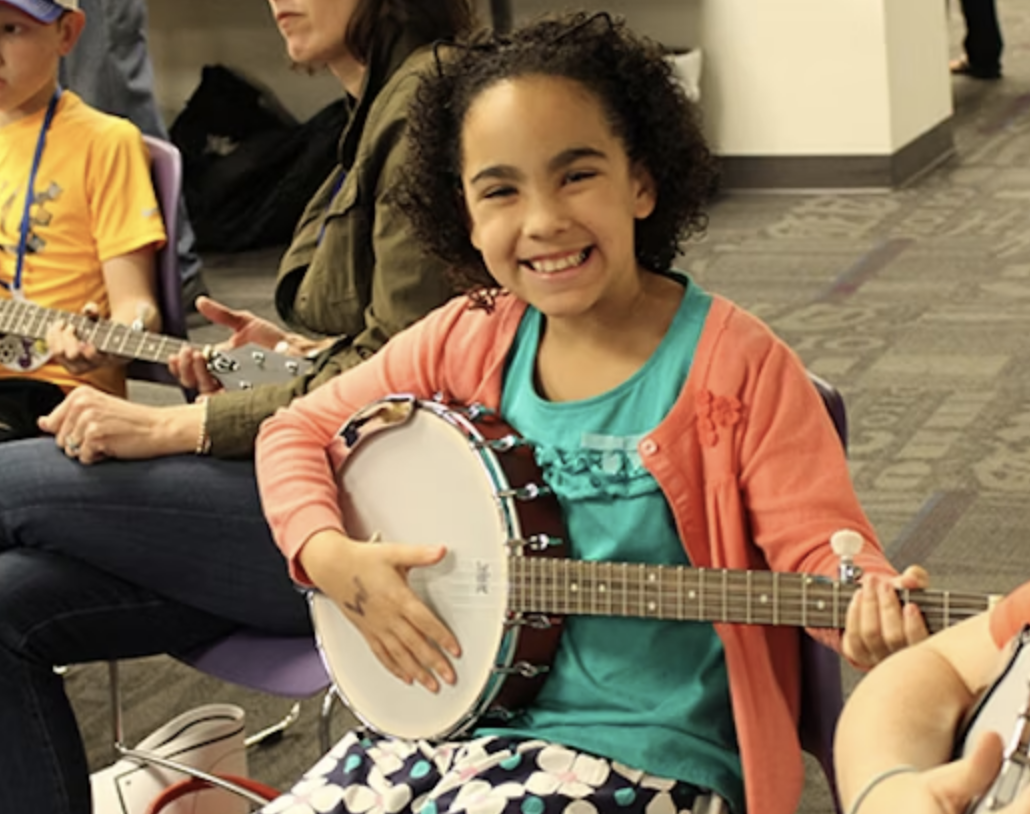 Boy Playing Banjo